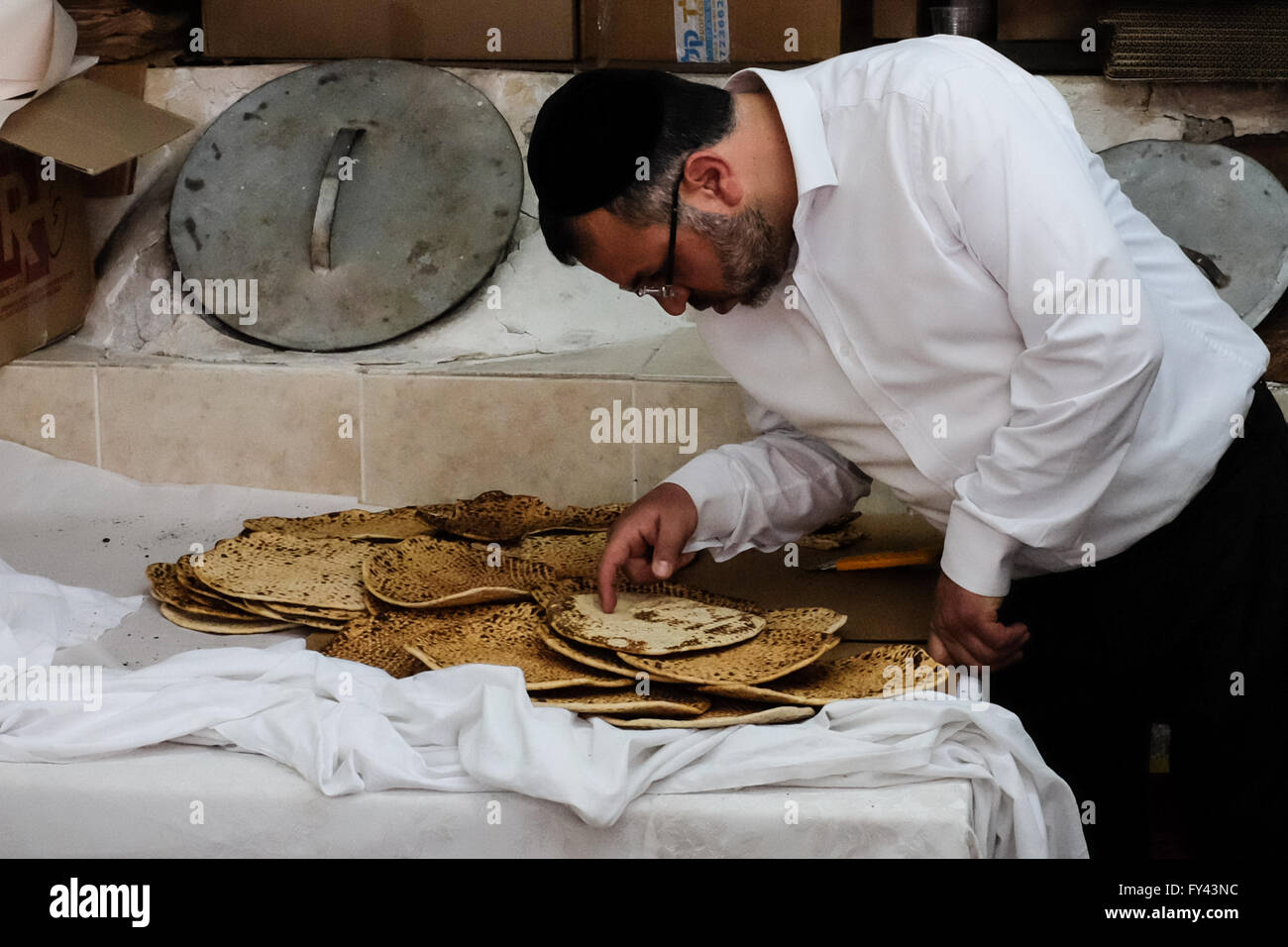 Jerusalem, Israel. 21st April, 2016. Jewish men prepare matzah ...