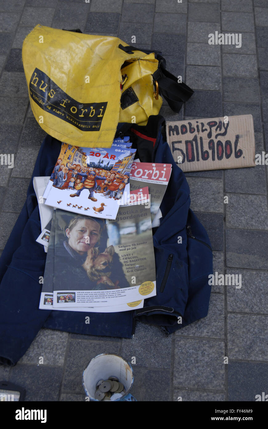 Copenhagen, Denmark. 21st April, 2016. Male selling homeless magazine ...