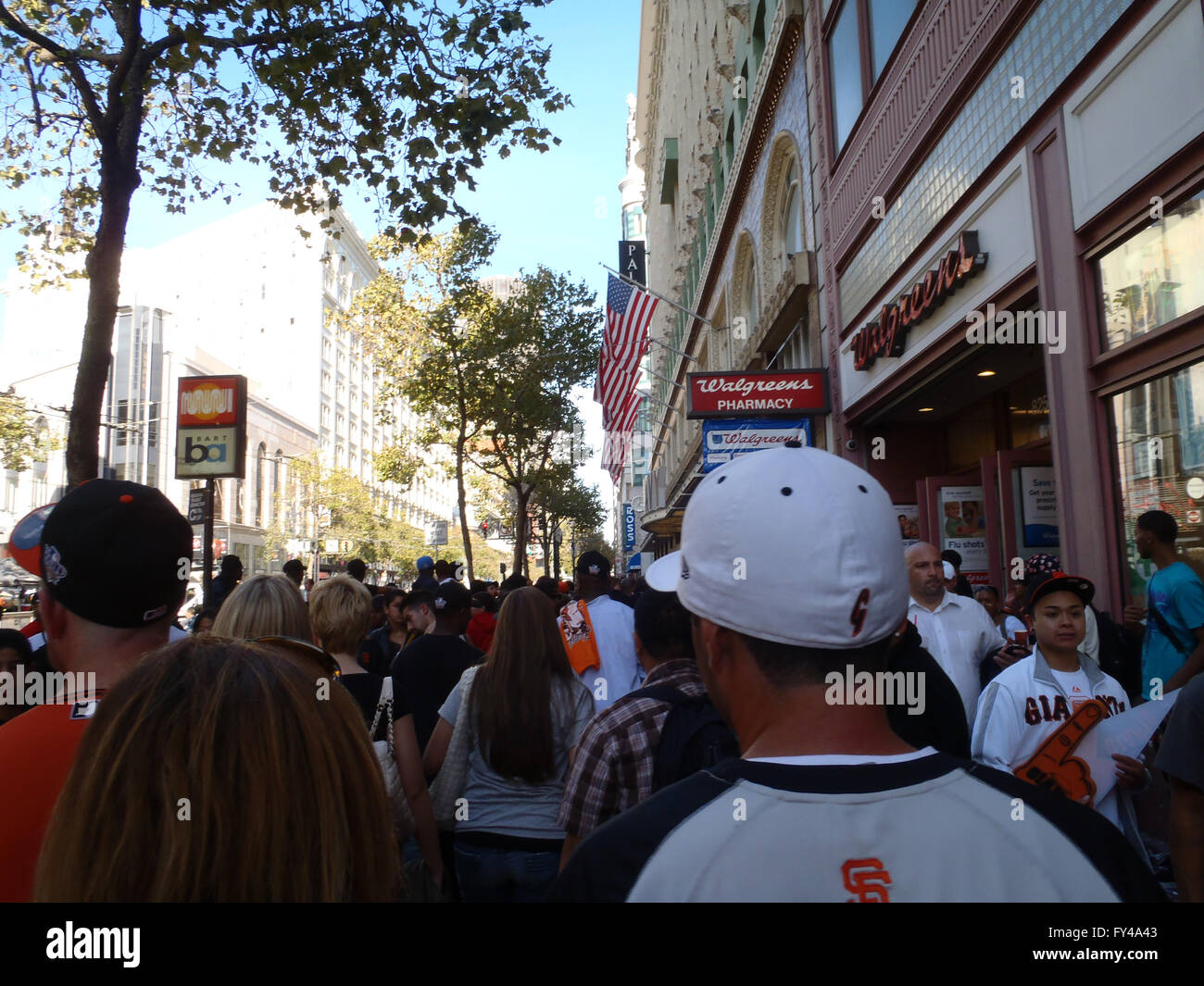 SAN FRANCISCO, CA - NOVEMBER 3: Crowd of Giants fans walk down Market ...