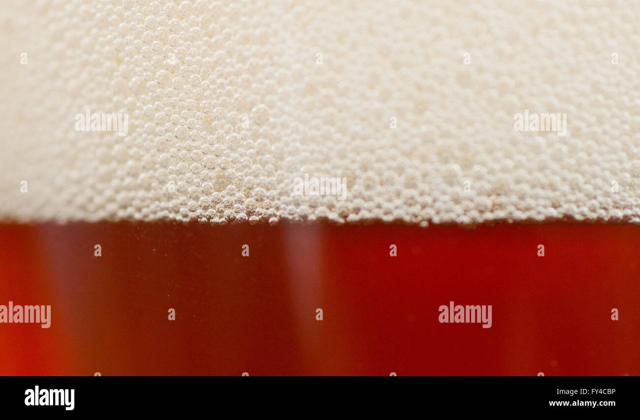 Rye wheat beer can be seen in a glass at the Stoertebeker Brewery in ...