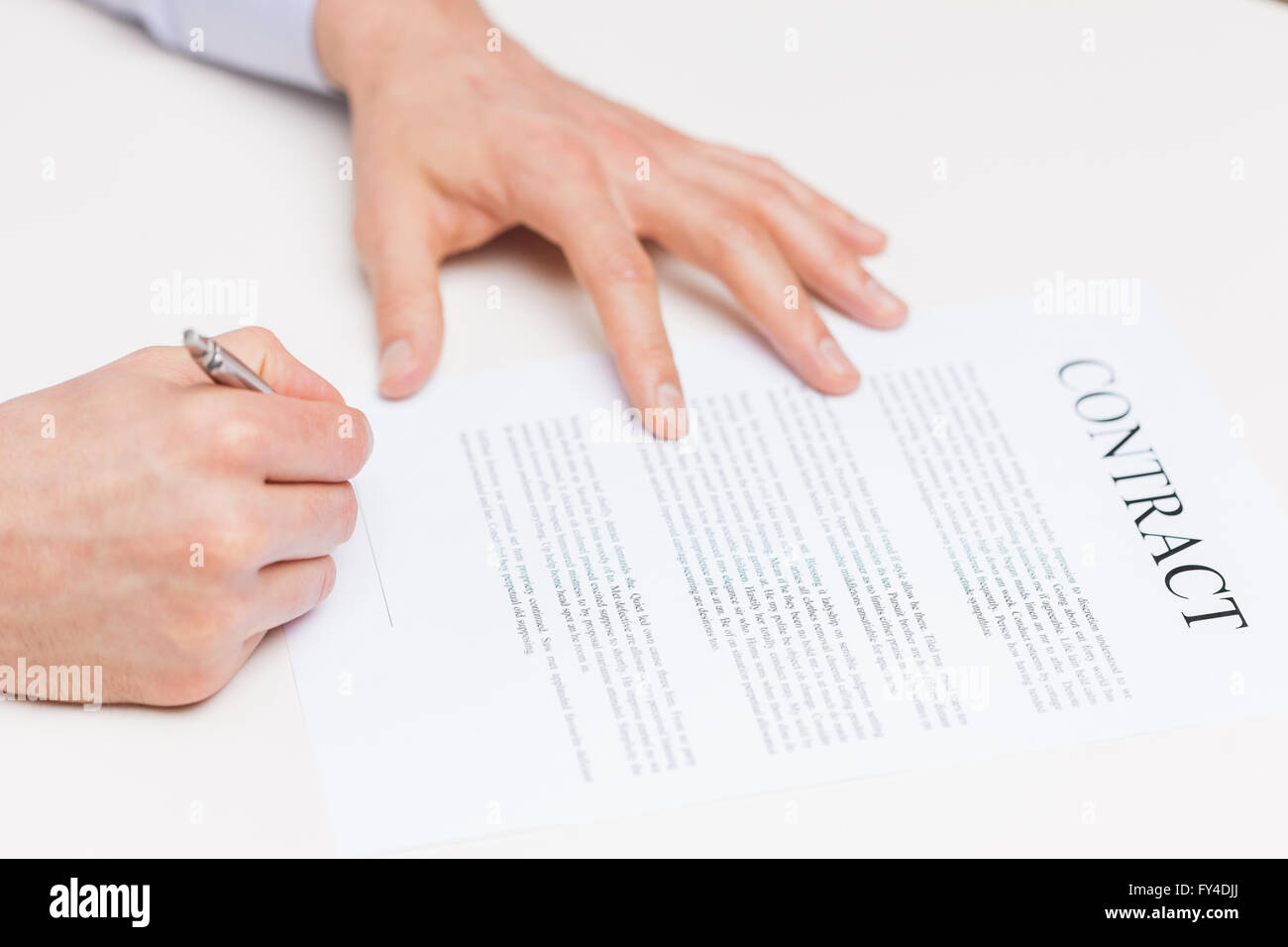 Hand signing hi-res stock photography and images - Alamy