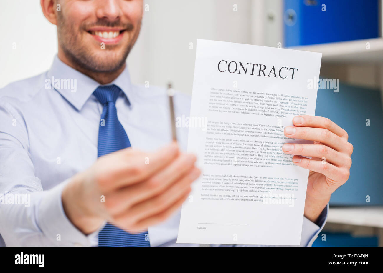 close up of businessman holding contract document Stock Photo - Alamy