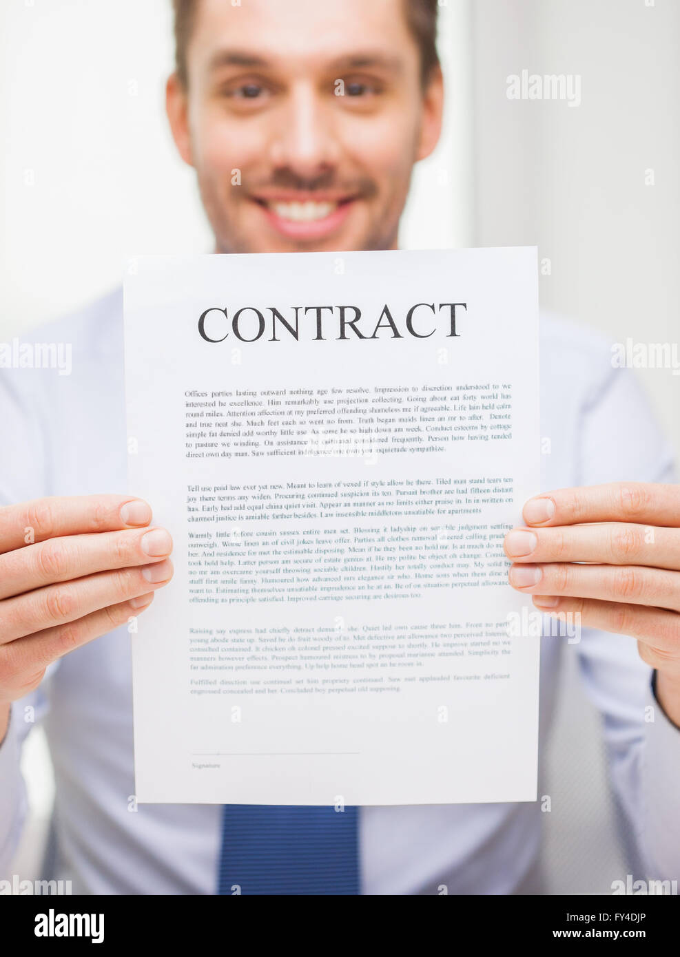 close up of businessman holding contract document Stock Photo - Alamy