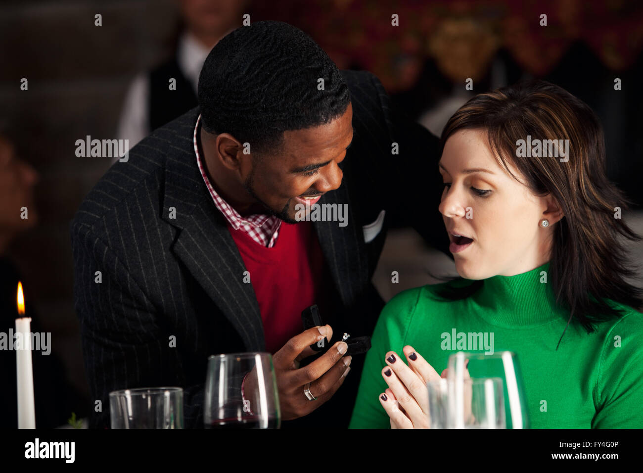 Series with a variety of people having a meal in a fancy restaurant ...