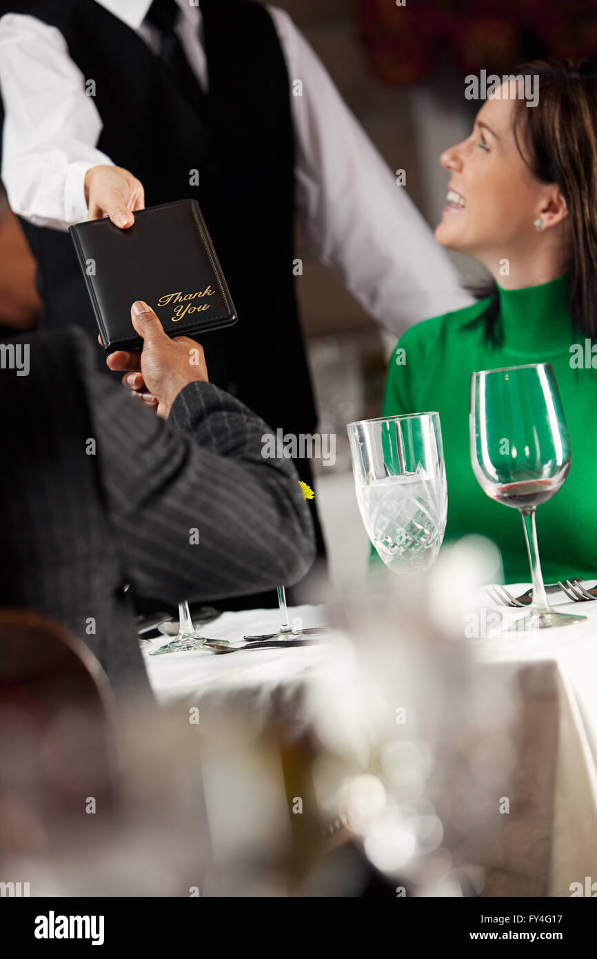 Series with a variety of people having a meal in a fancy restaurant ...