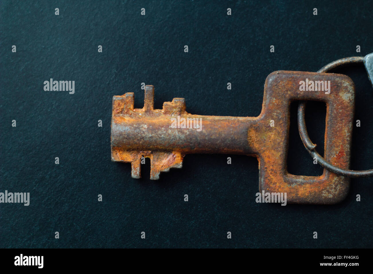 Old rusty key on dark background Stock Photo - Alamy Old rusty key on dark background Stock Photo - Alamy