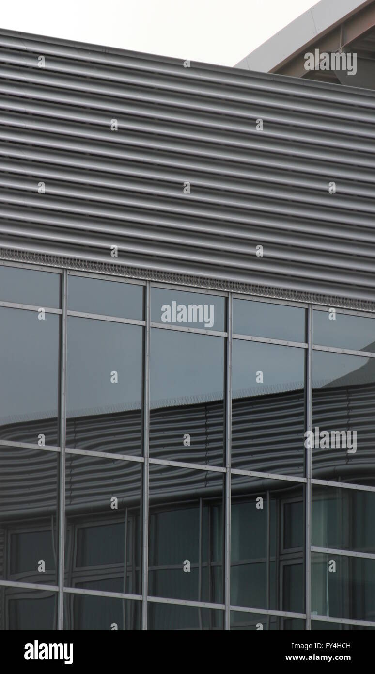 Reflections on modern building facade Stock Photo - Alamy