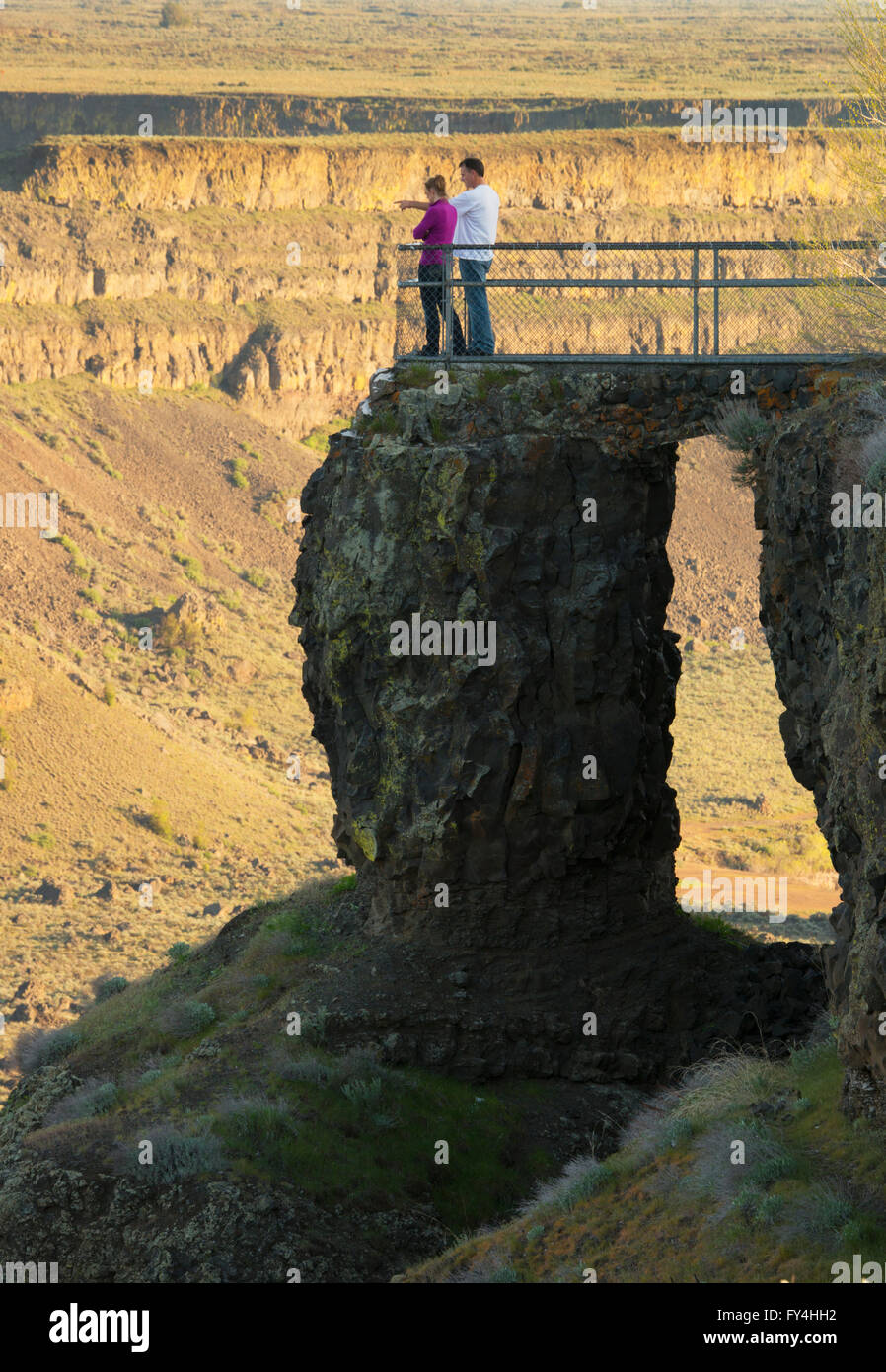 Couple at viewpoint, Dry Falls State Park, Site of massive Ice Age ...
