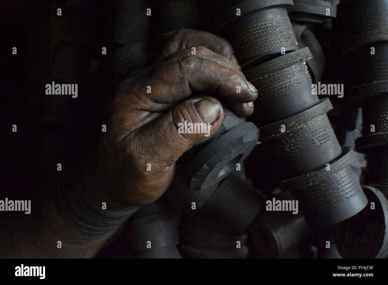 Hand of working man covered with oil Stock Photo - Alamy