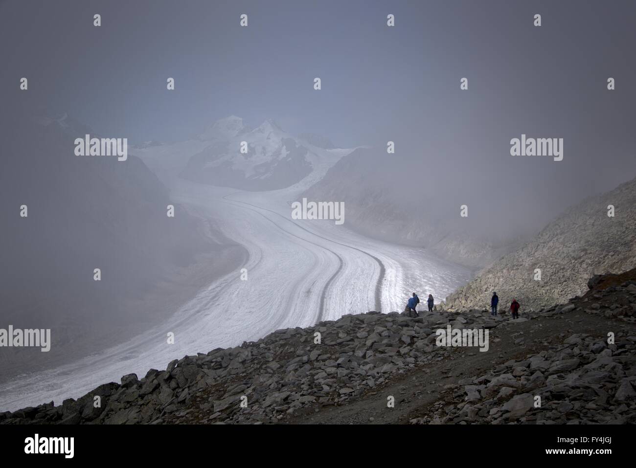 Aletsch Glacier in mist Stock Photo - Alamy
