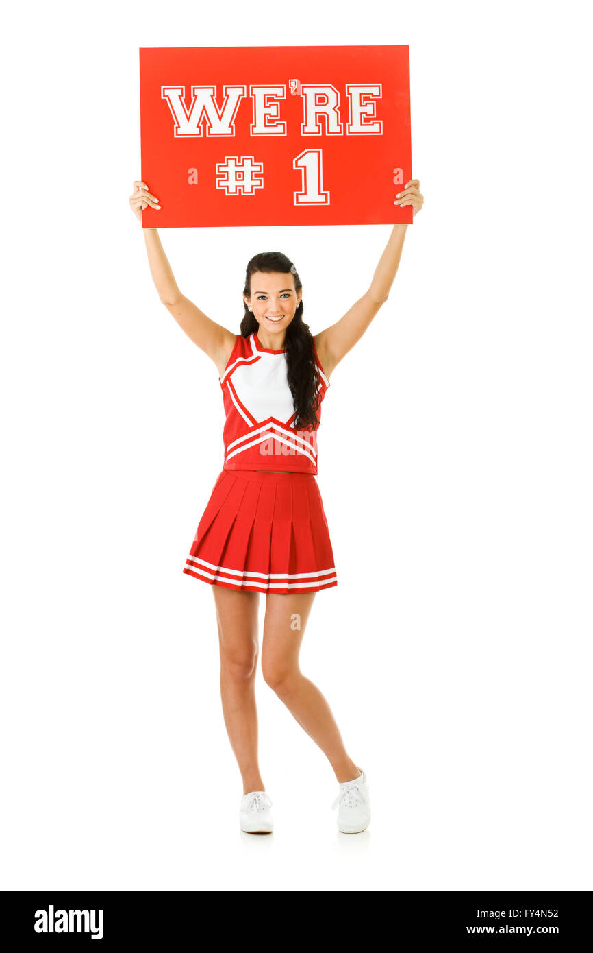 Cute female as an American sports cheerleader, in red and white outfit ...