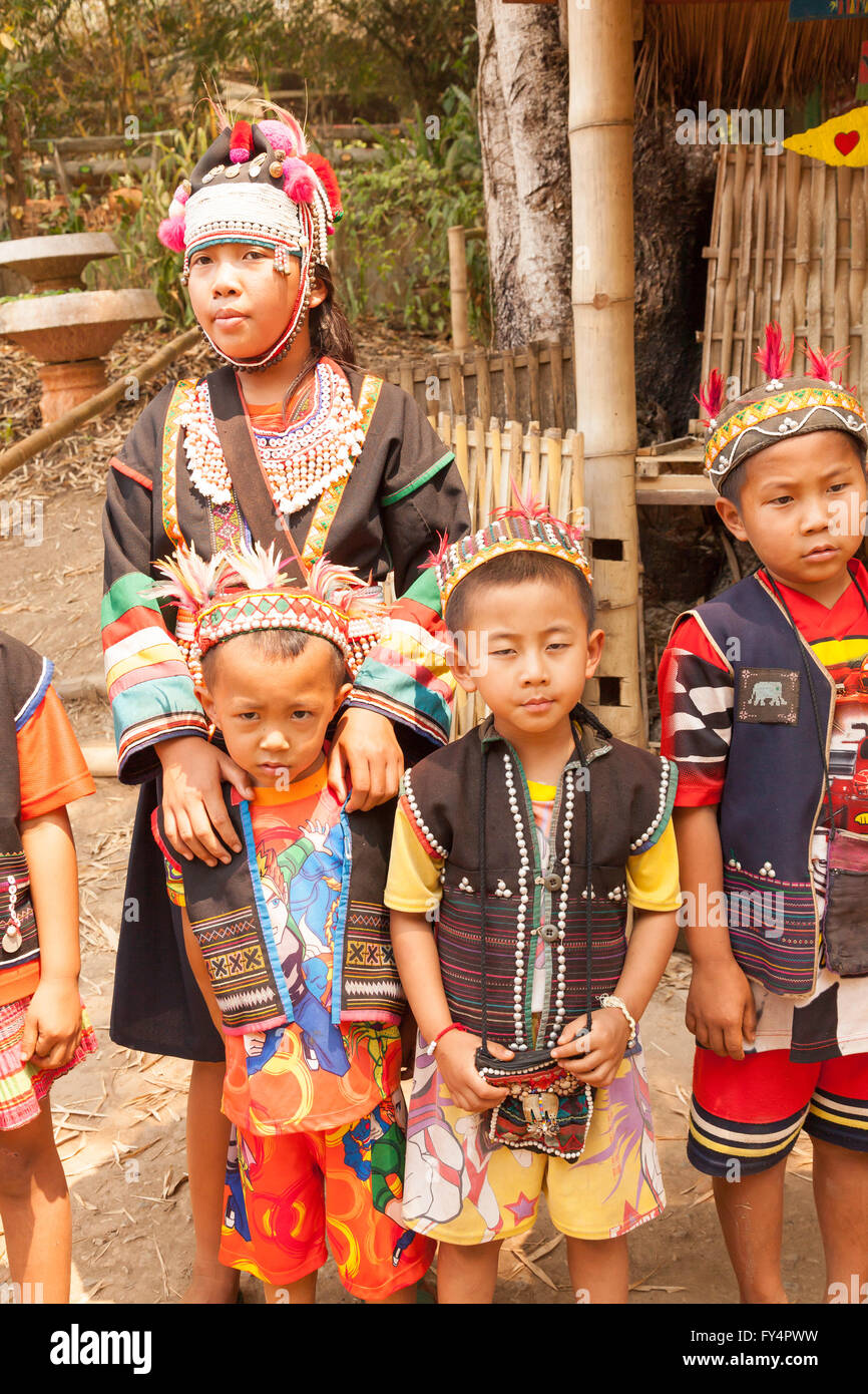 Traditionally dressed kids from the Akha people, hill tribe, ethnic ...