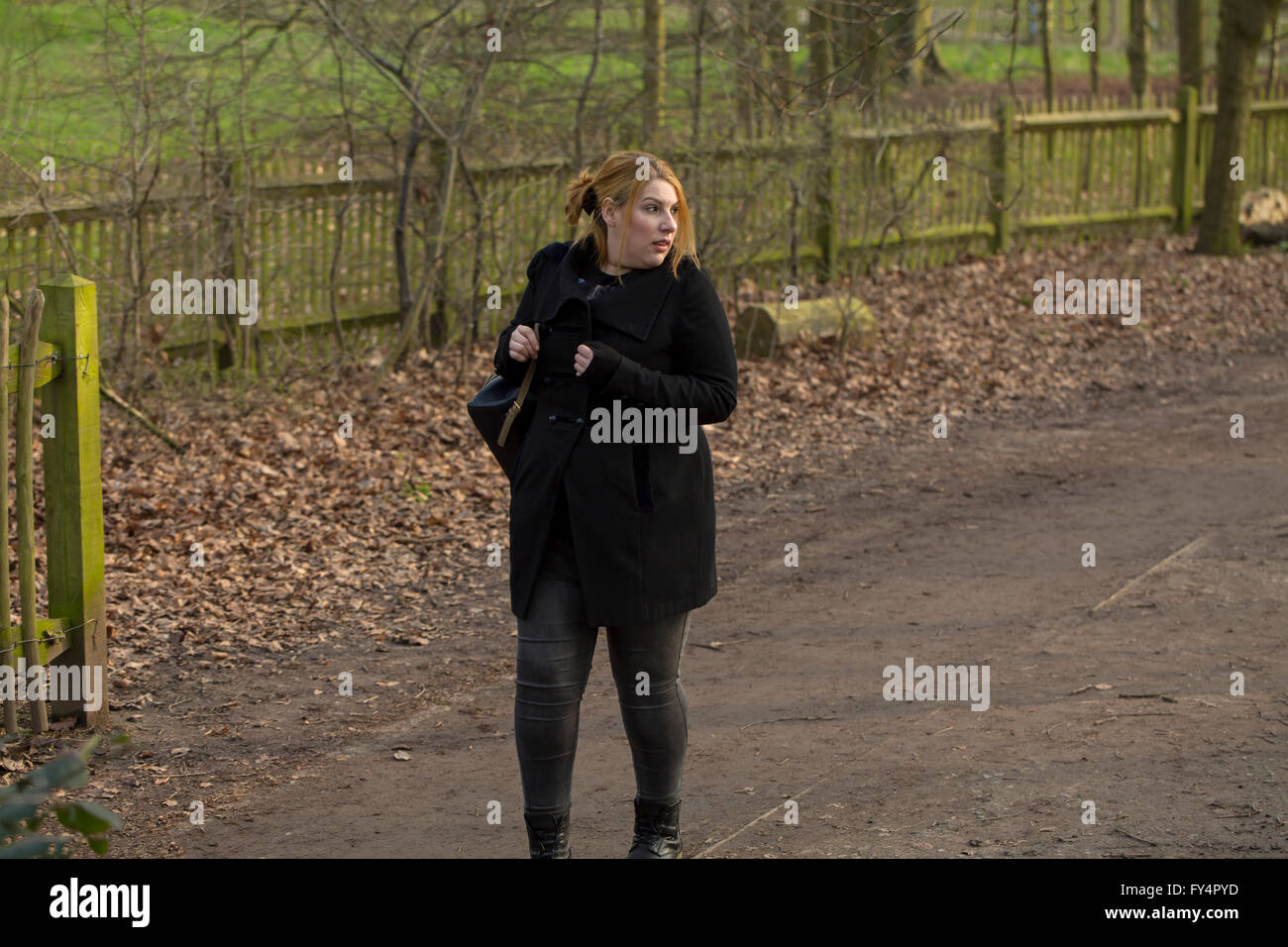 A woman is walking home through the park alone and she feels the fear ...