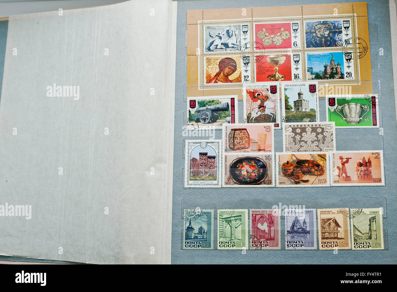 Collection of postage stamps in album printed from USSR Stock Photo - Alamy