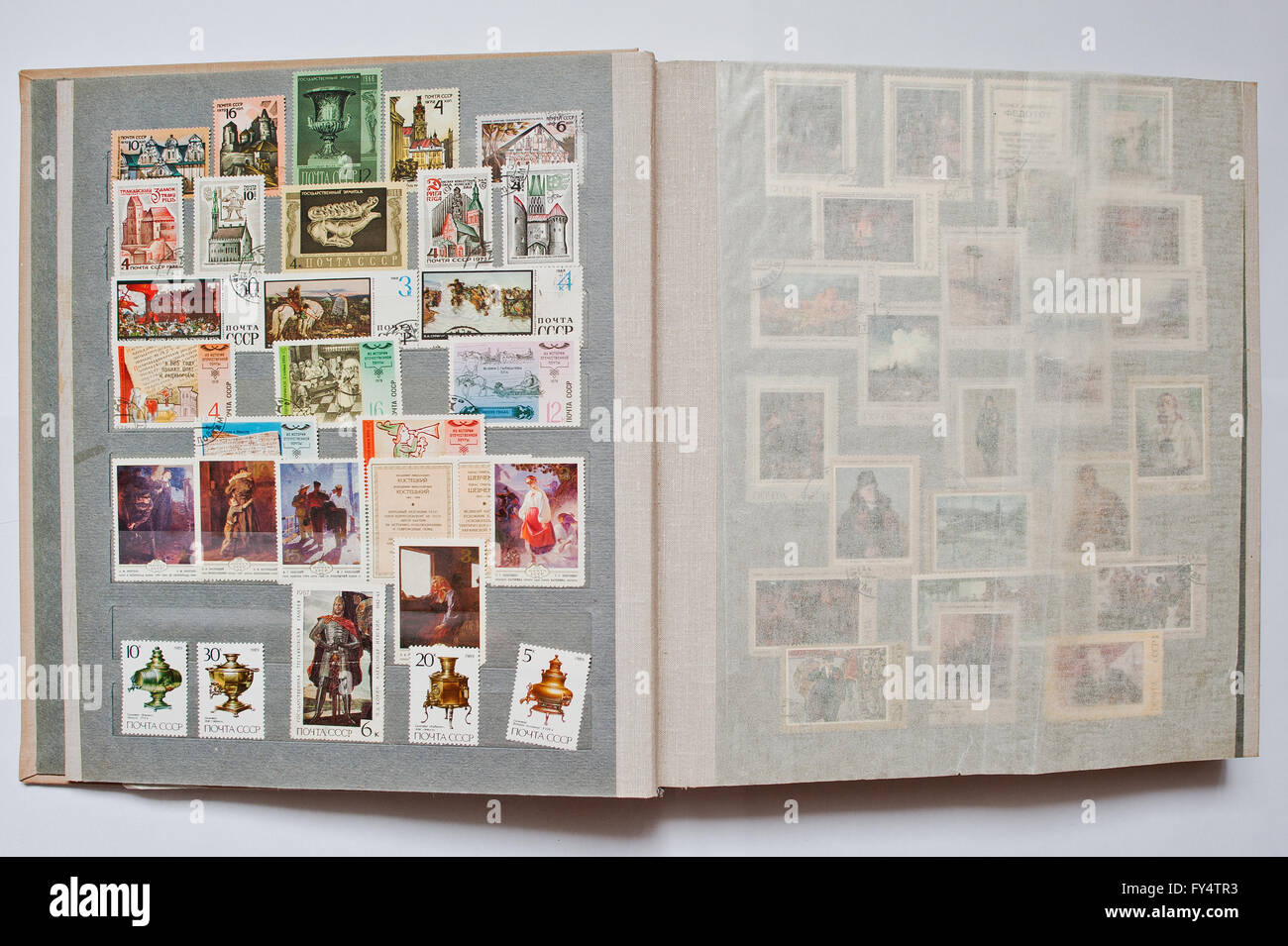 Collection of postage stamps in album printed from USSR Stock Photo - Alamy