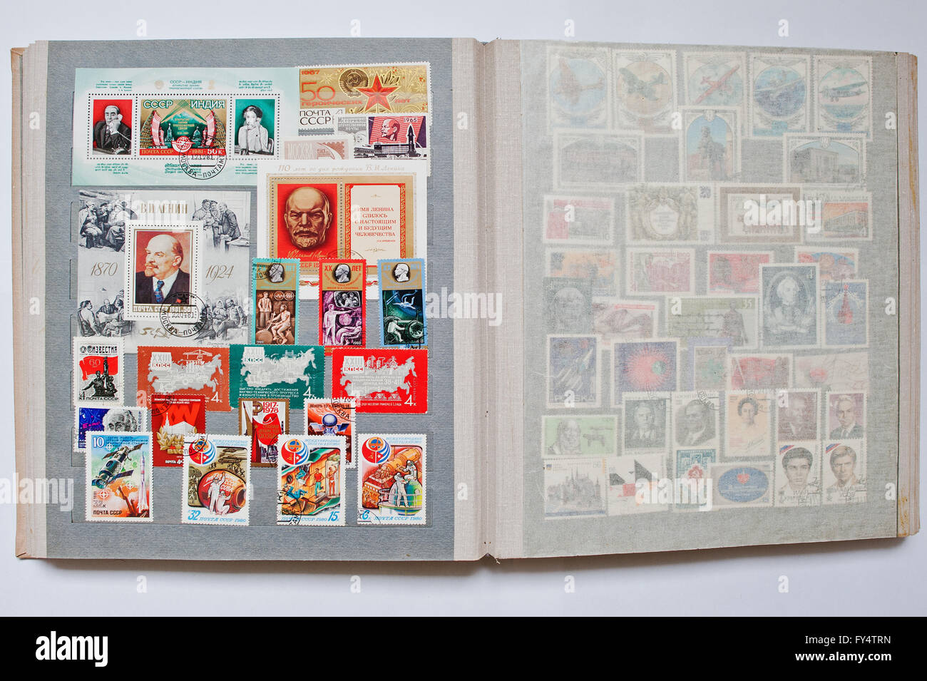 Collection of postage stamps in album printed from USSR Stock Photo - Alamy