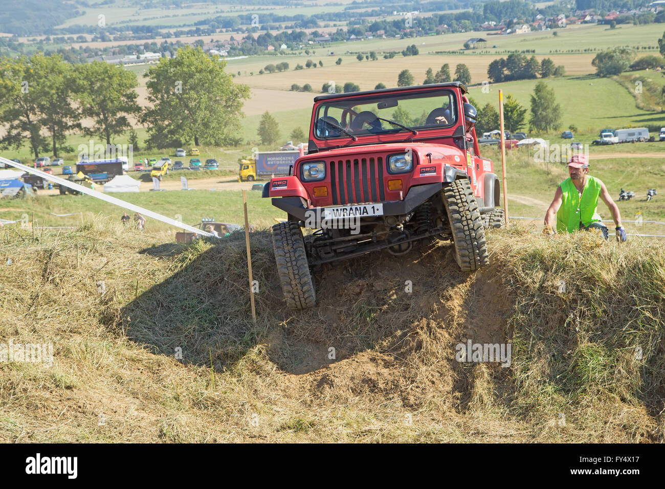 Red Jeep off-road cars on a trial race Stock Photo - Alamy