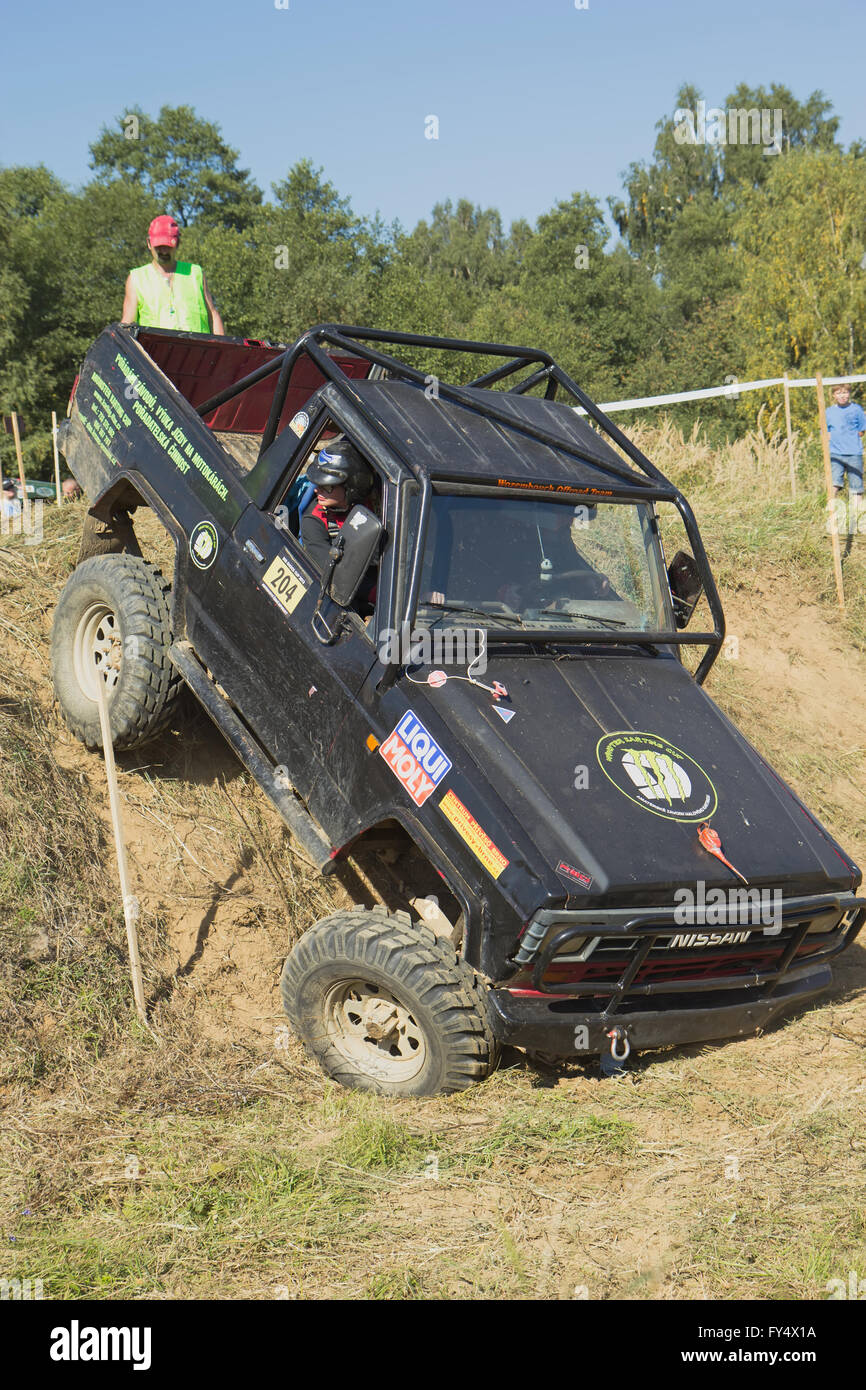 Off-road cars on a trial race in the "BIG SHOCK CUP Trial 2013" on ...