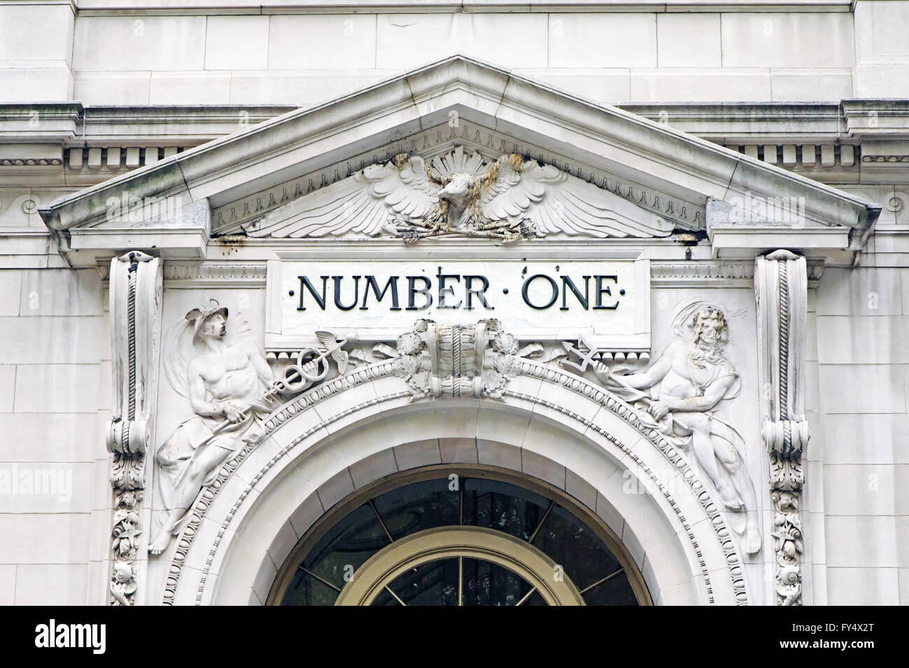 The facade of the building with the inscription NUMBER ONE above the ...