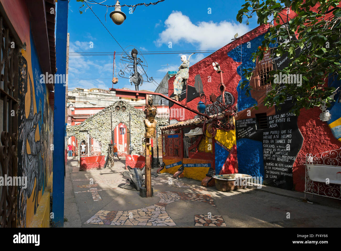 Horizontal view of the art installations inside Hamel's Alley in Havana ...