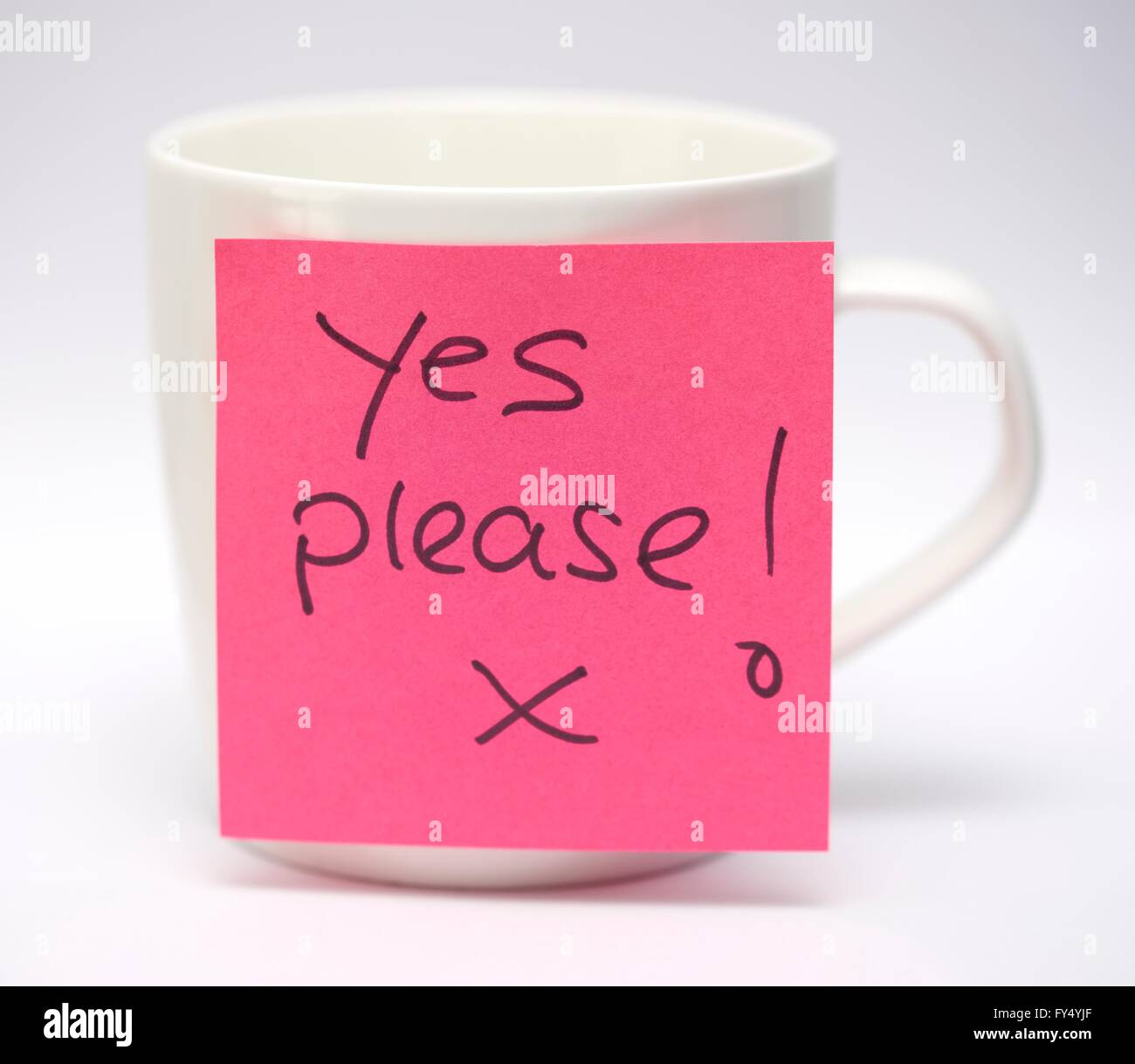 A post it note on a white mug with a hand written message yes please ...