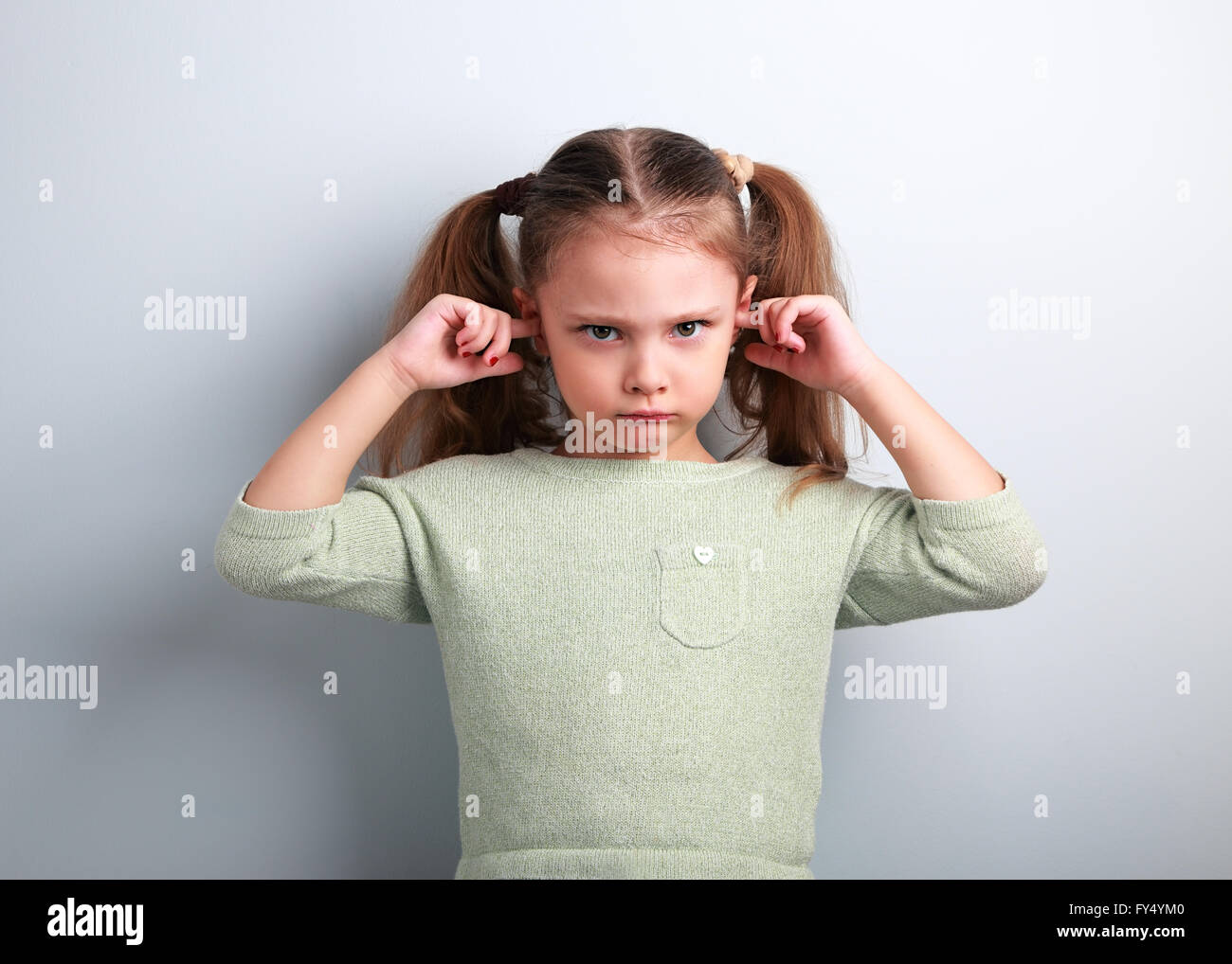 White girl cover ears hi-res stock photography and images - Alamy