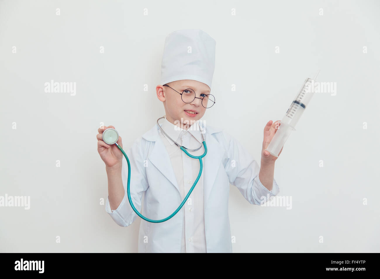 Little boy in doctor costume Stock Photo - Alamy