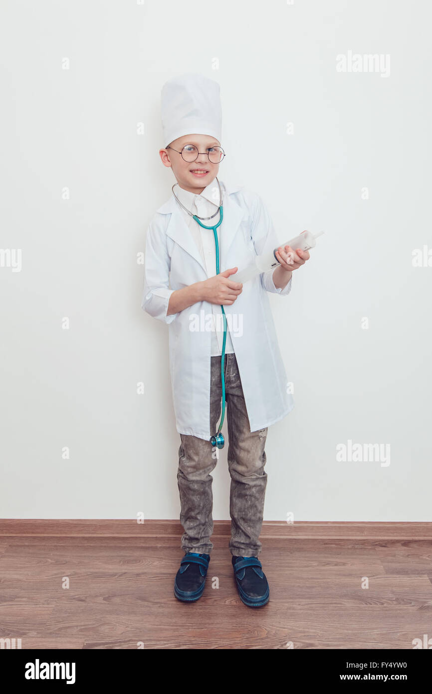 Little boy in doctor costume Stock Photo - Alamy