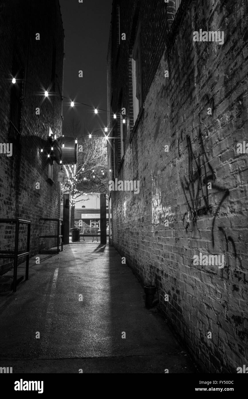 Lights in dark alley Black and White Stock Photos & Images - Alamy