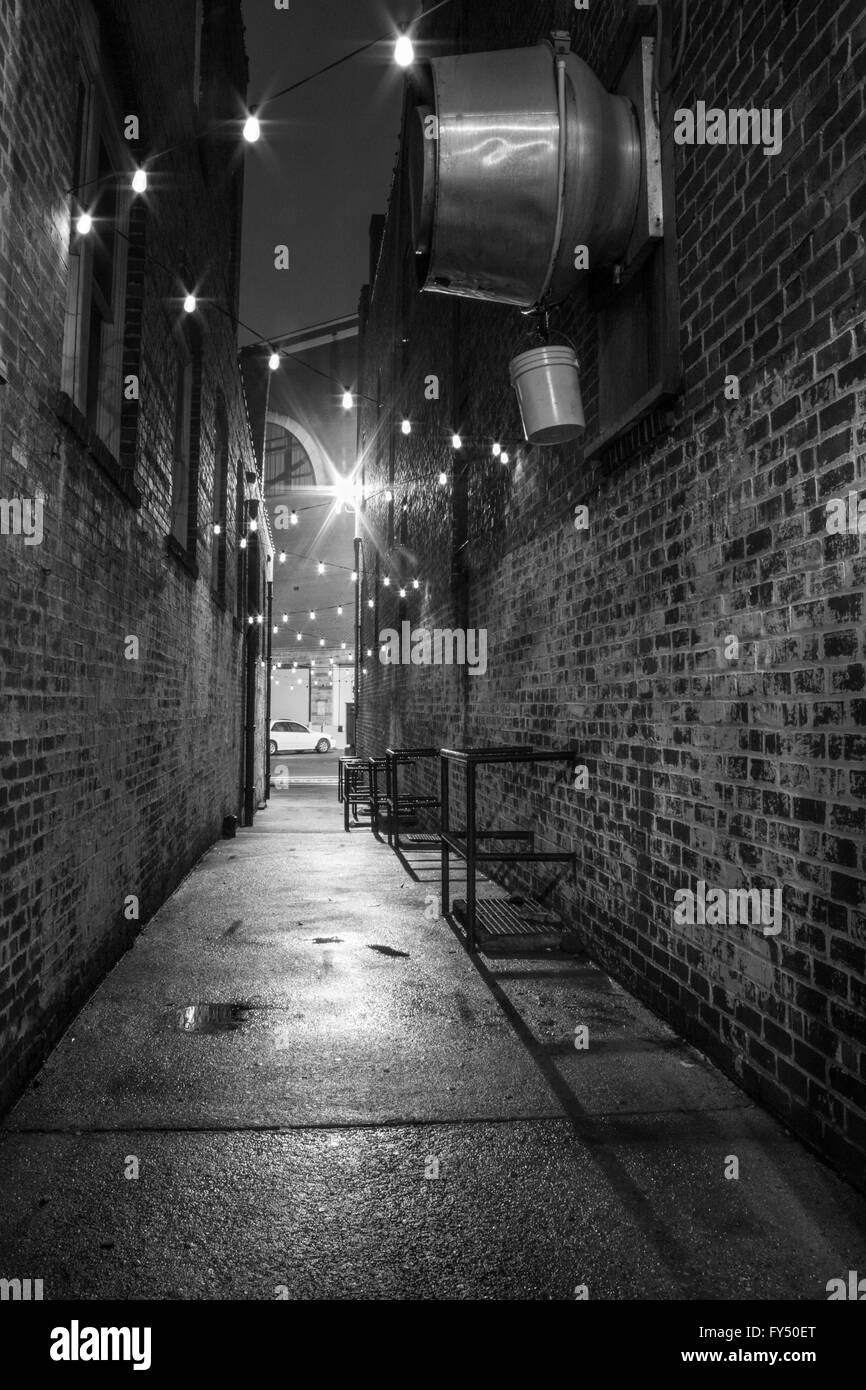 Small town alley after a rain Stock Photo - Alamy