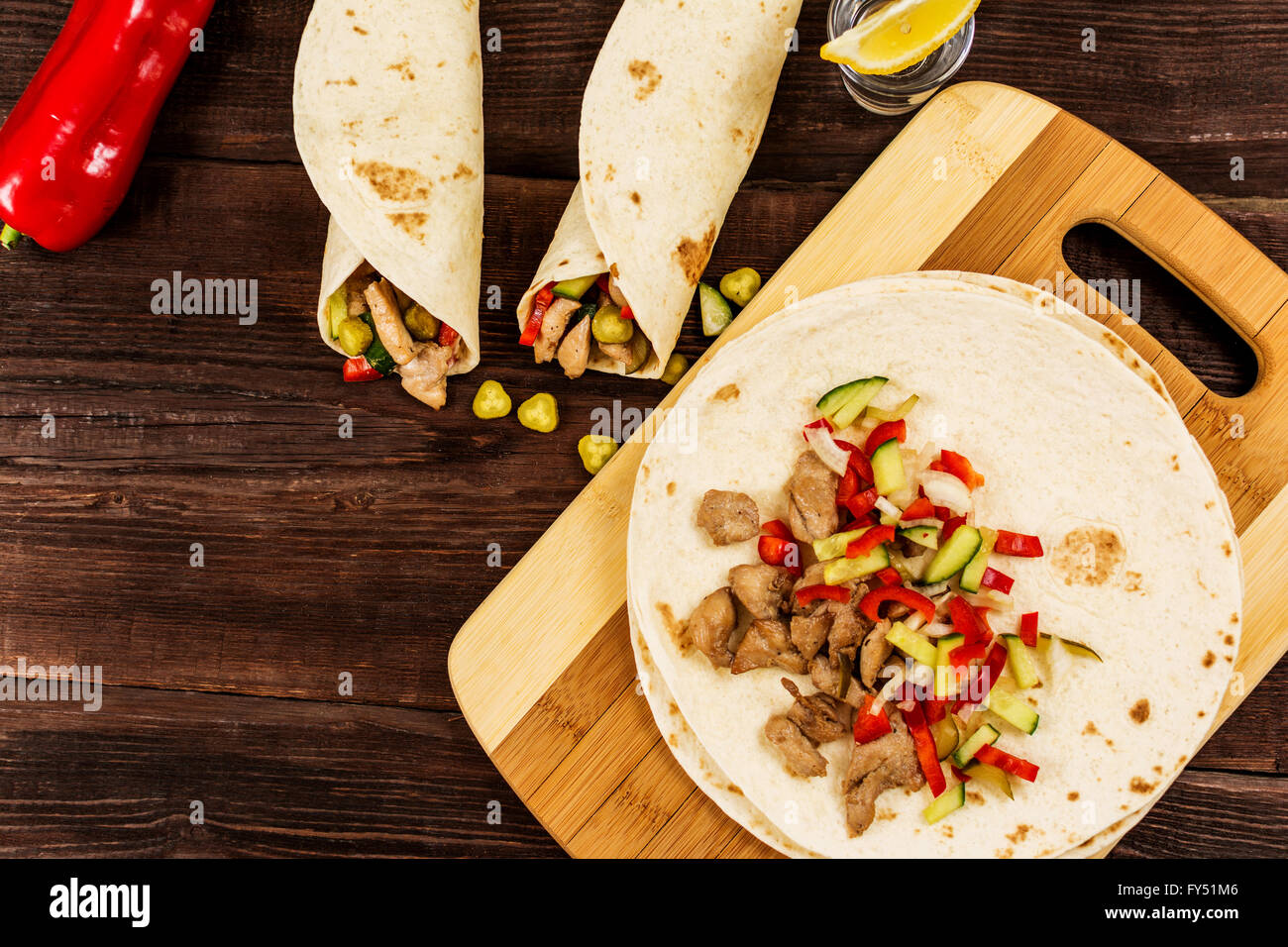 Traditional mexican tortilla wrap with meat and vegetables Stock Photo ...