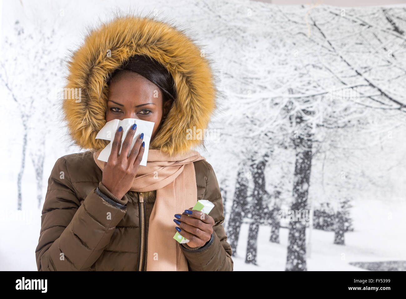 Closeup portrait sick young african woman with hooded coat with fur ...