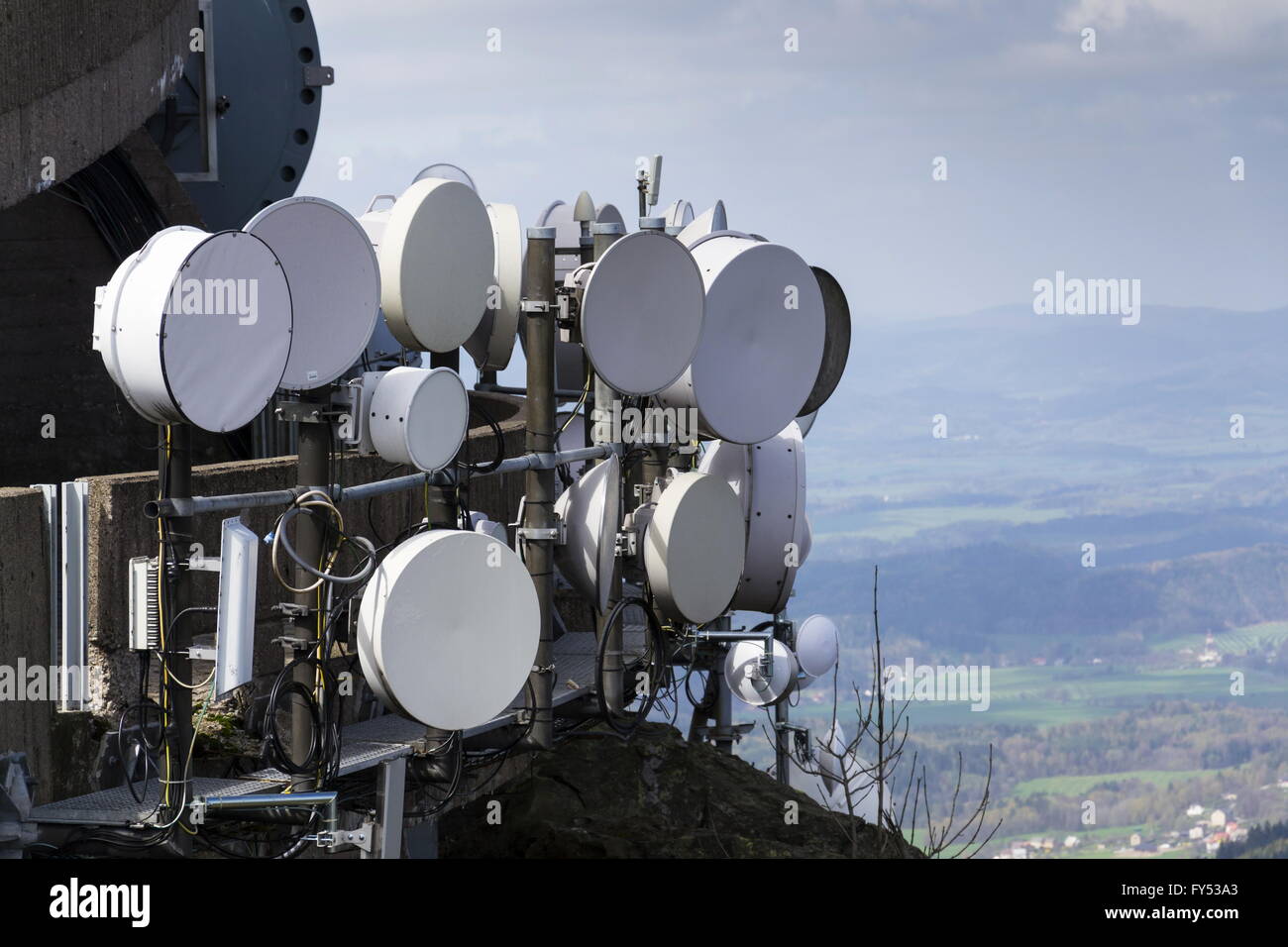 Bunch of transmitters and aerials on the telecommunication tower Stock Photo - Alamy