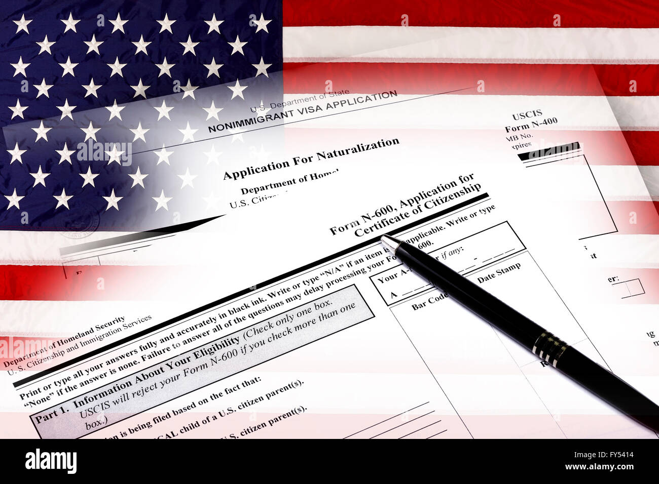 Immigration naturalization application and USA flag concept of ...