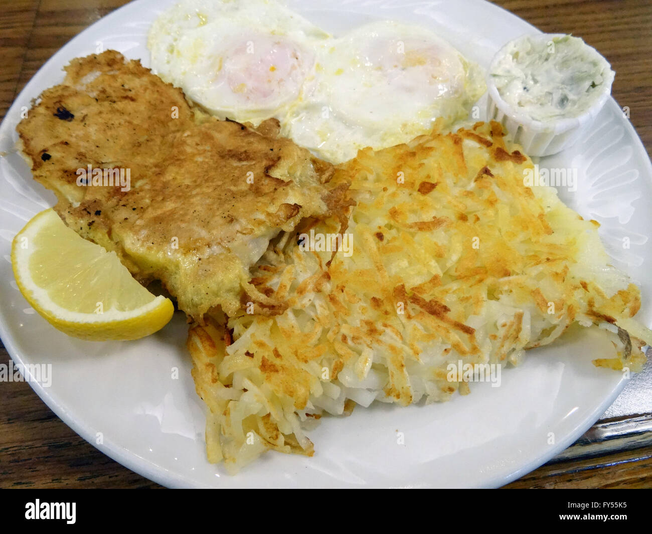 Breaded and fried BREAKFAST Mahi Mahi AND With two eggs served with ...