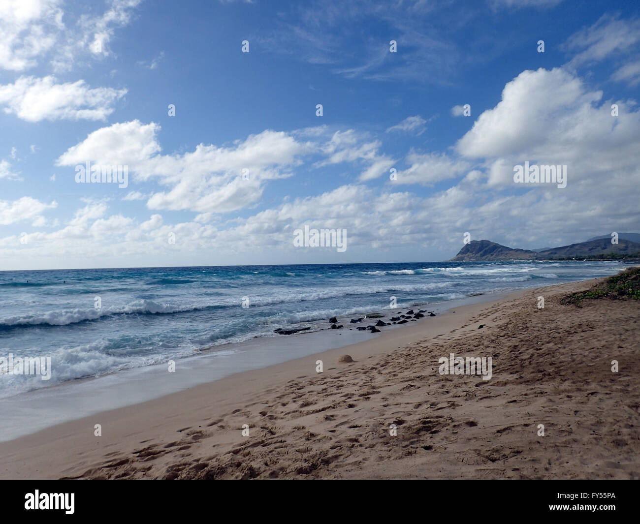 Waves break along the shore of Manners Beach on the western coast of ...