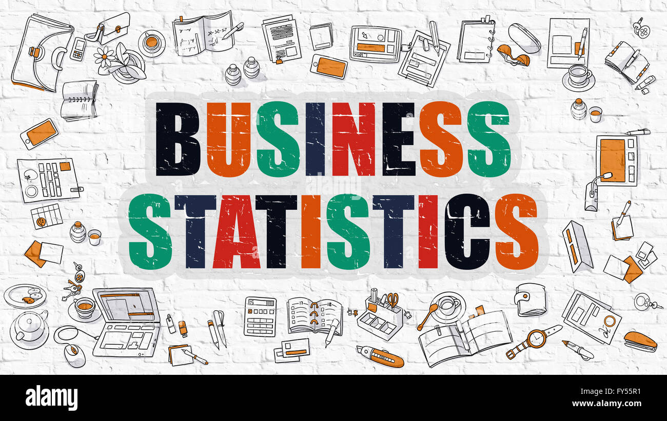 Business Statistics on White Brick Wall Stock Photo - Alamy