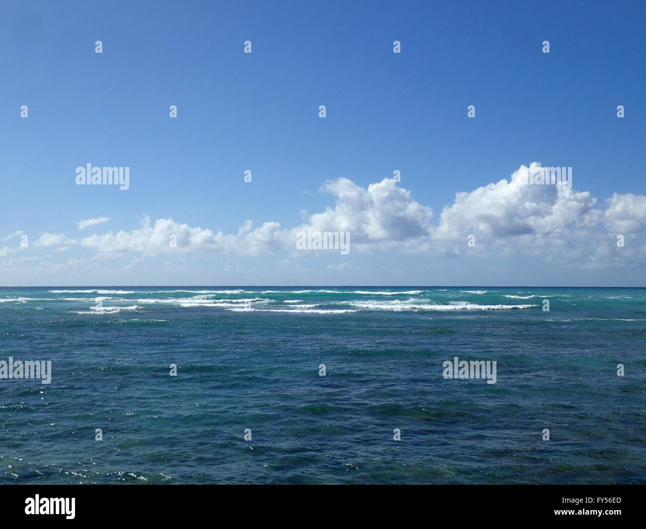 Shallow wavy ocean waters of Waimanalo bay looking into the pacific ...