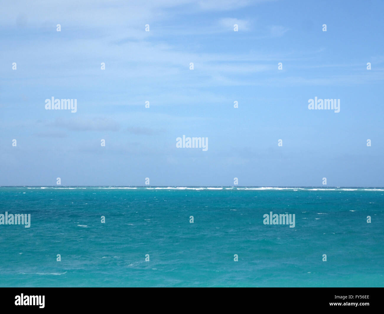 Shallow wavy ocean waters of Waimanalo bay looking into the pacific ...