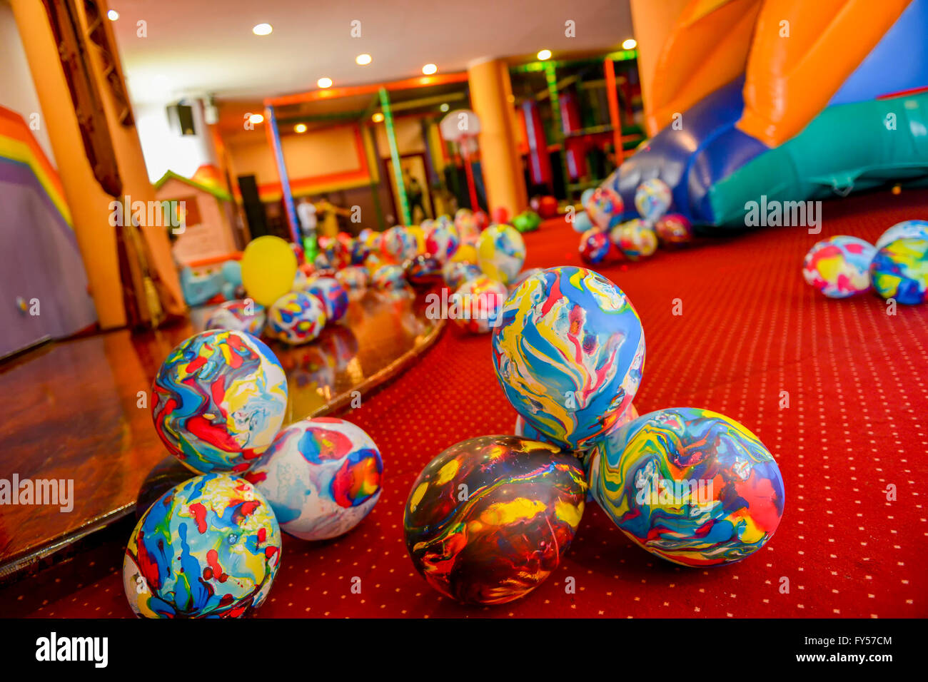 Many colorful balloons in a playground Stock Photo - Alamy