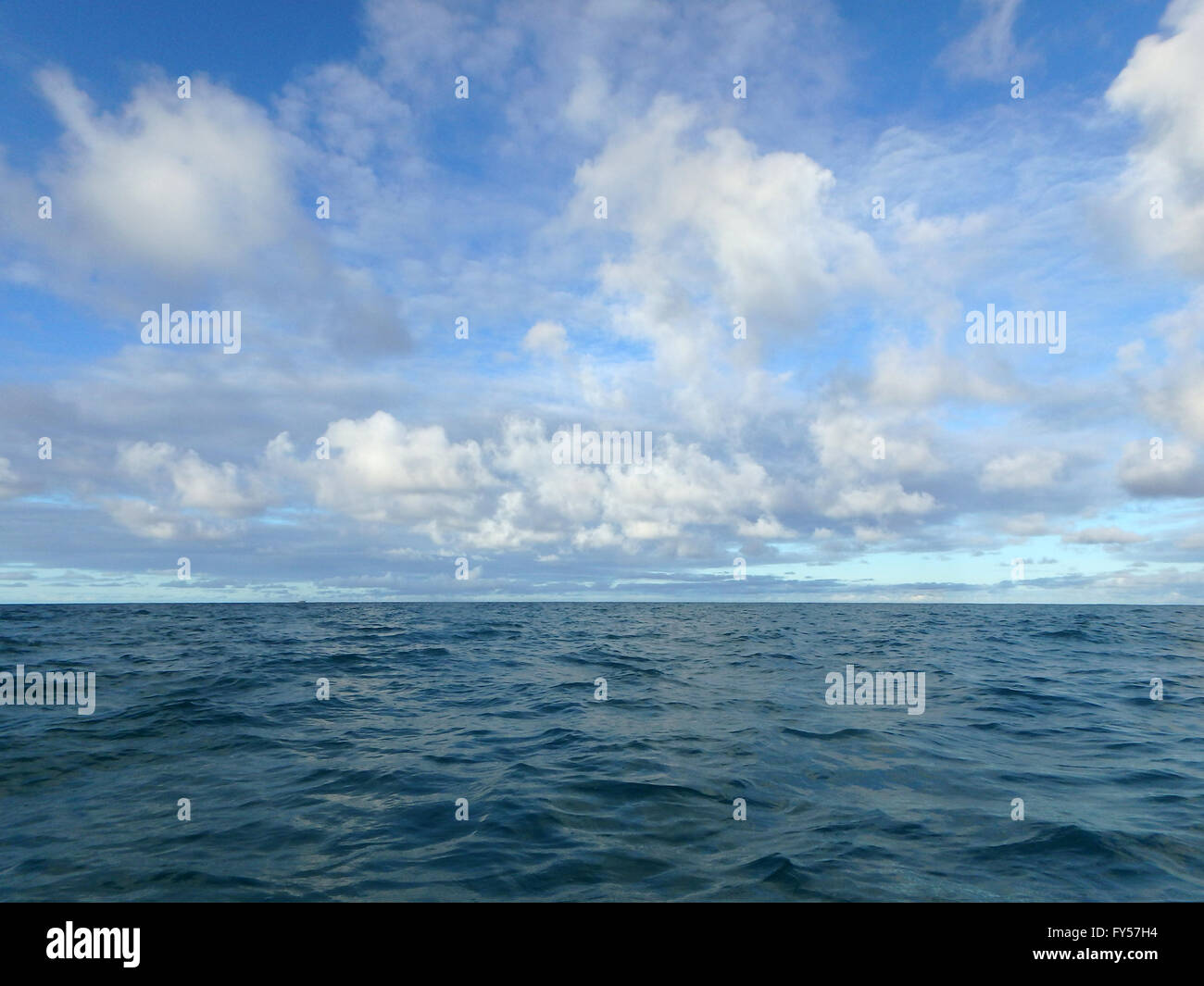 Shallow wavy ocean waters of Waimanalo bay looking into the pacific ...