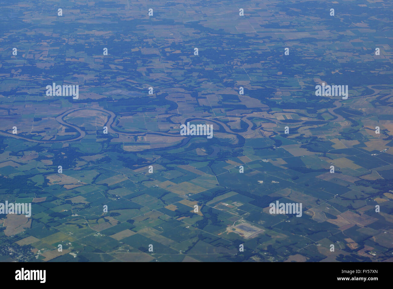 aerial photograph of rural middle USA with river running though the ...