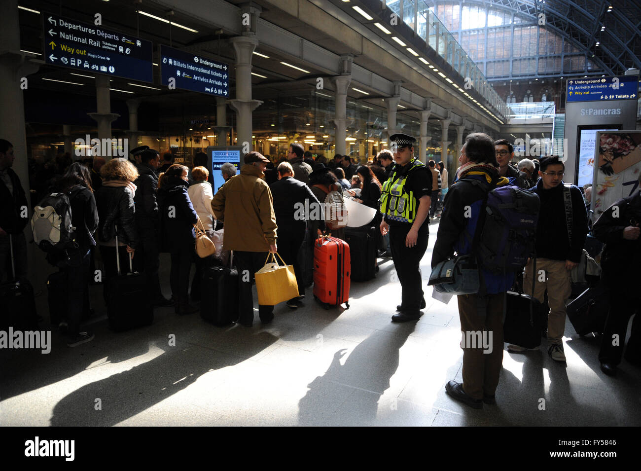 Extra armed police are brought into Eurostar where long queues formed ...