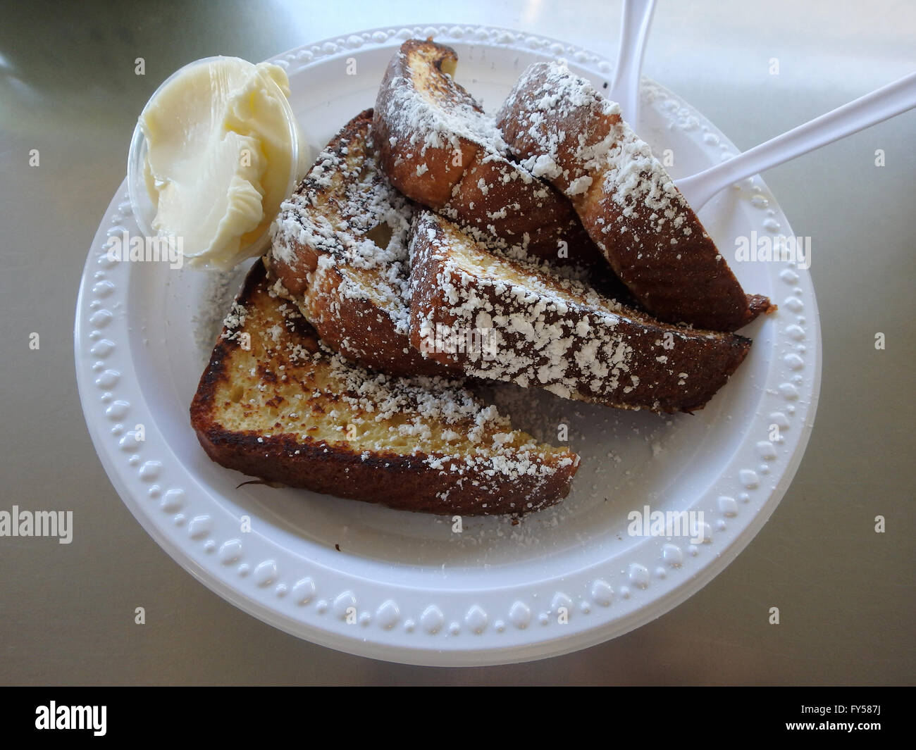 Sweet Bread French Toast - 5 Pieces with cup of butter on a plastic ...