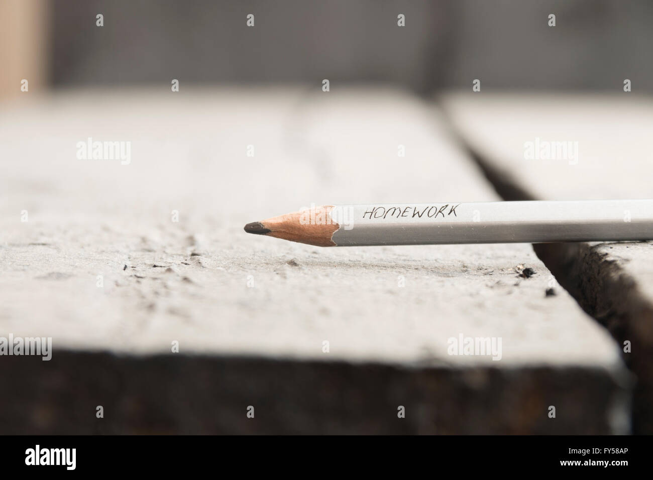 Homework, inscription in pencil Homework Stock Photo - Alamy