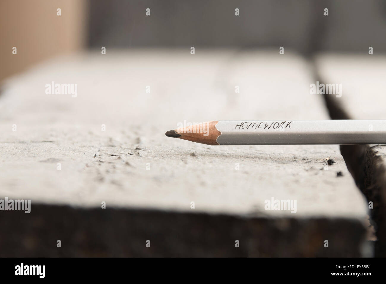 Homework, inscription in pencil Homework Stock Photo - Alamy