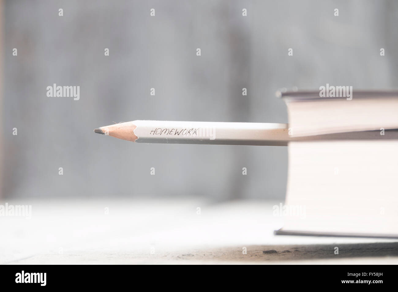 Homework, inscription in pencil Homework Stock Photo - Alamy