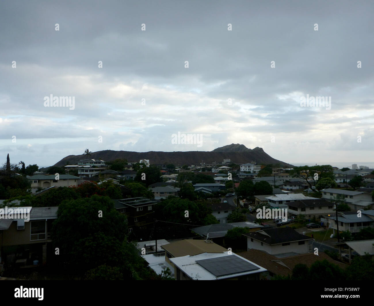 Diamondhead and homes of the town of Kaimuki on Oahu on a cloudy day ...