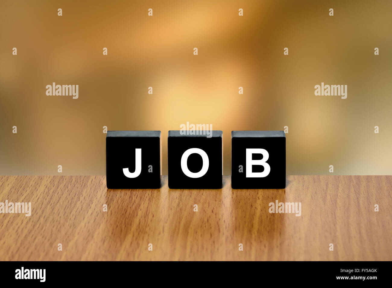 job on black block with blurred background Stock Photo - Alamy