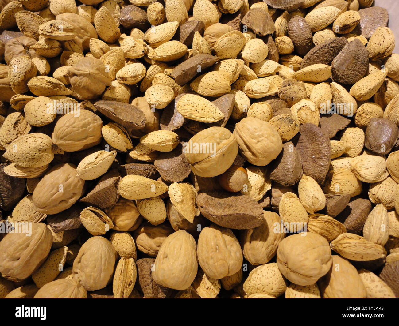 Natural background made from different kinds of nuts Stock Photo - Alamy